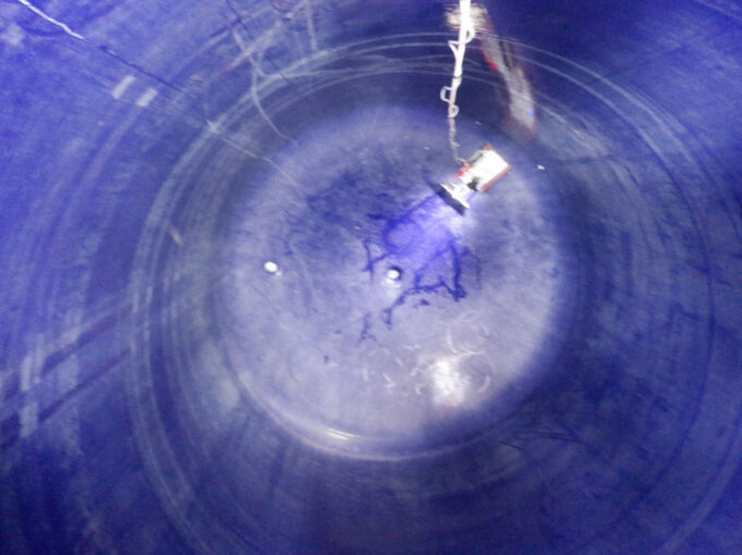 Visual inspection and spark testing of glass lined storage tank ...